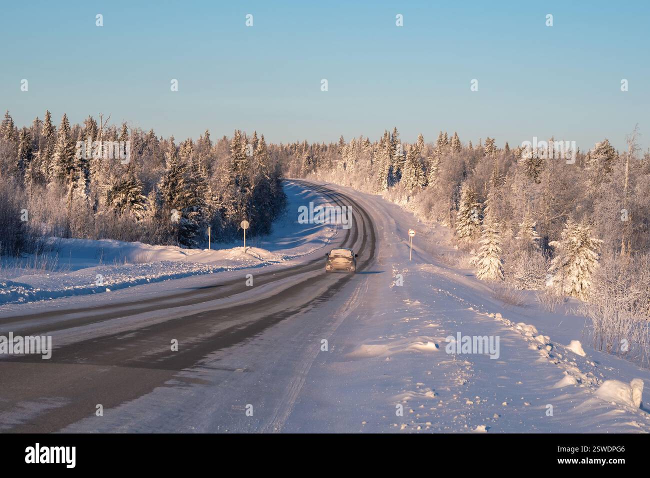Frozen winter road. Winter landscape with a view of the road. Severe ...