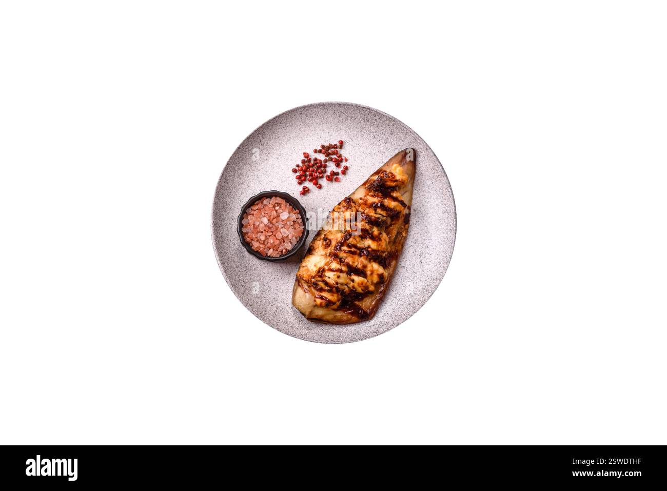 Grilled mackerel fillets with cheese, salt, spices and herbs on a white ...