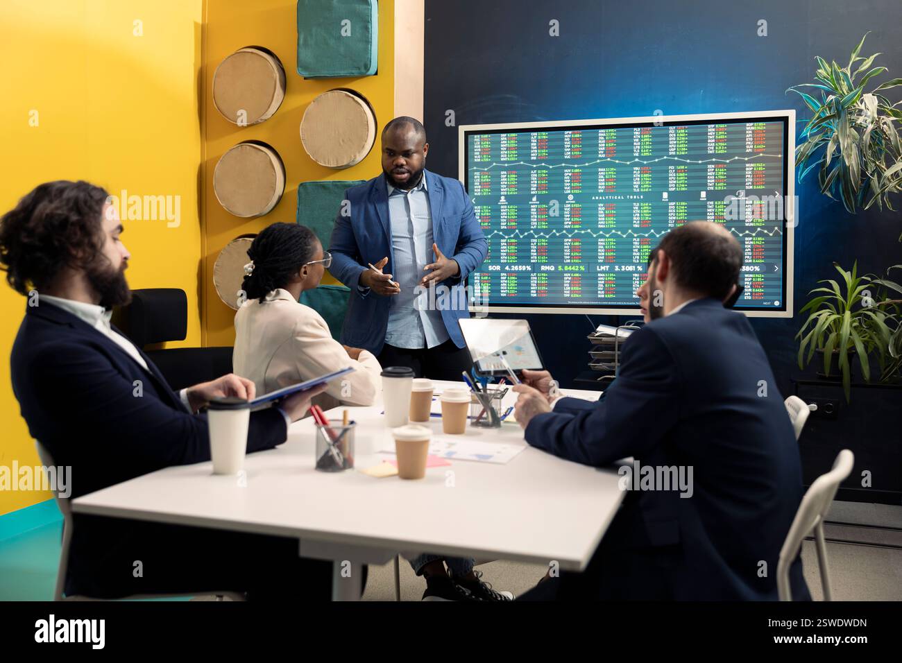 Executive workers measuring infographics data reports in a briefing ...