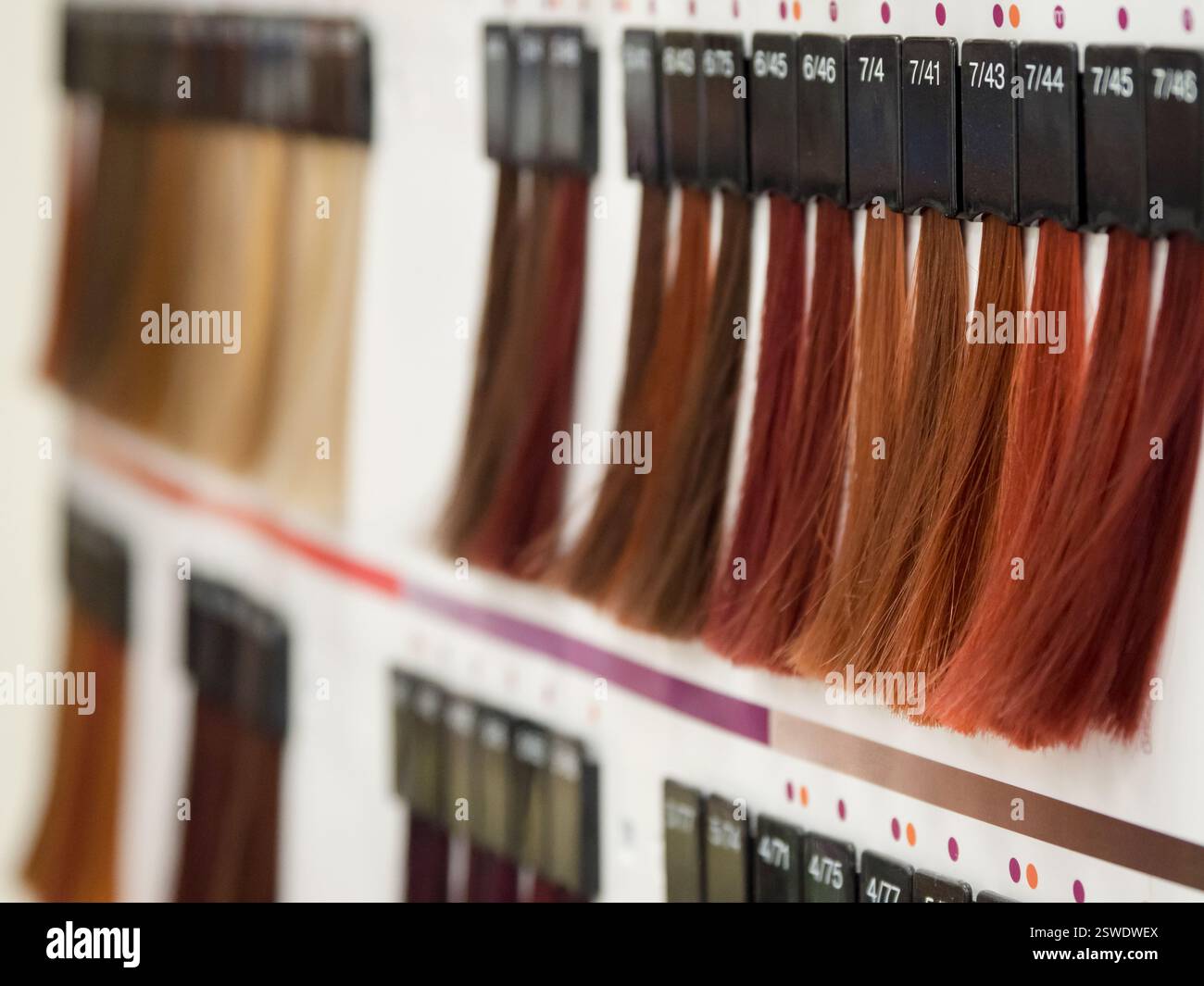 Selection of a shade of hair dye. Color of hair dyes Stock Photo - Alamy