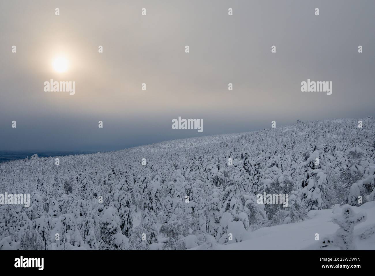 Cool sun. Sunrise over the snowy polar slope Stock Photo - Alamy