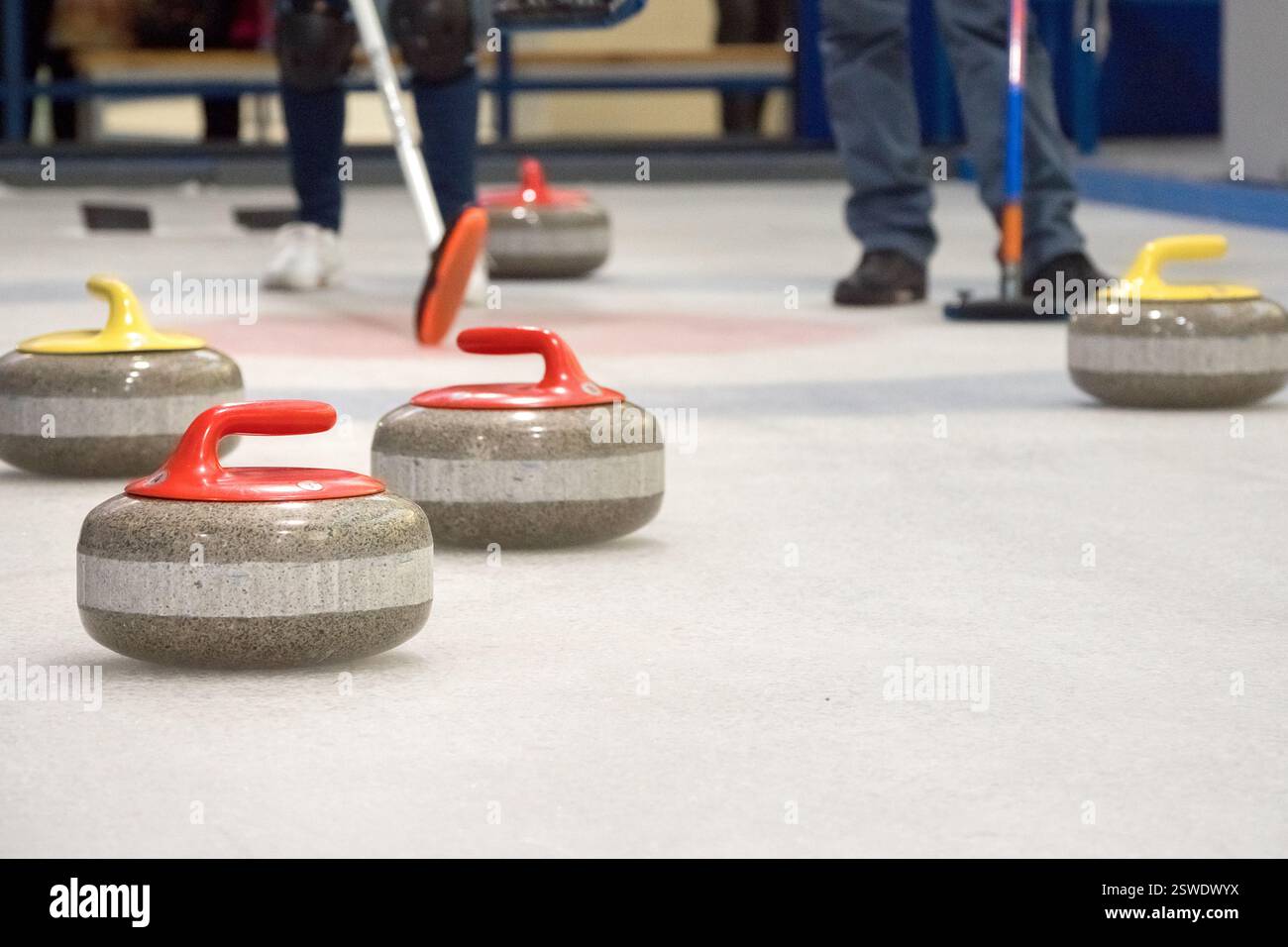 Group of stones for curlinggame in curling on ice Stock Photo - Alamy