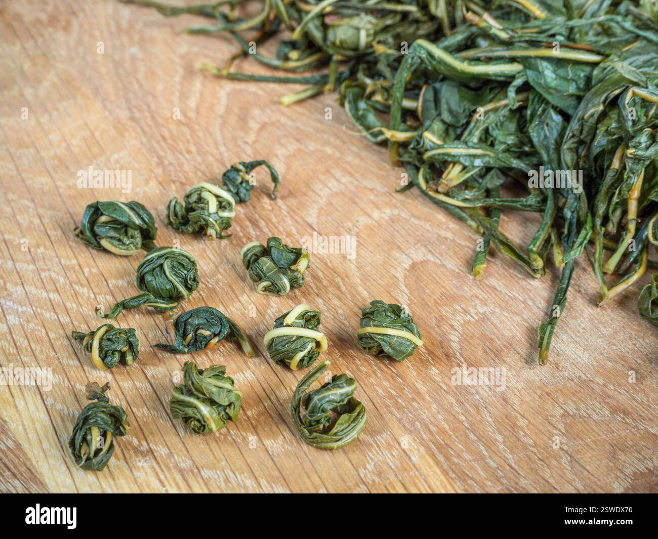Manual twisting of tea leaves for fermentation. Ivan tea fermentation ...