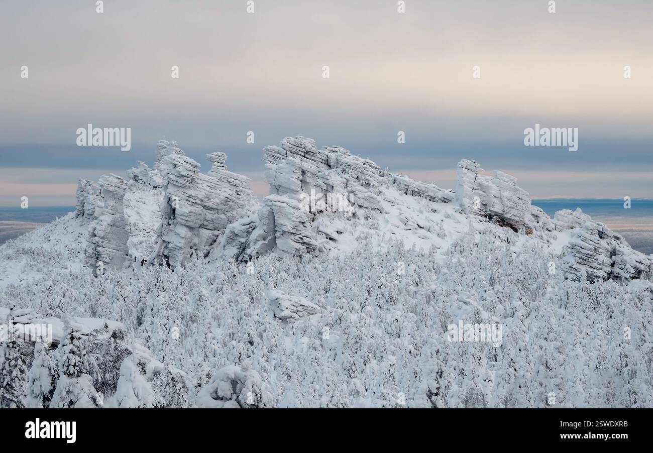 Rock cliff, Kolchinsky stone is covered with fluffy frost Stock Photo ...