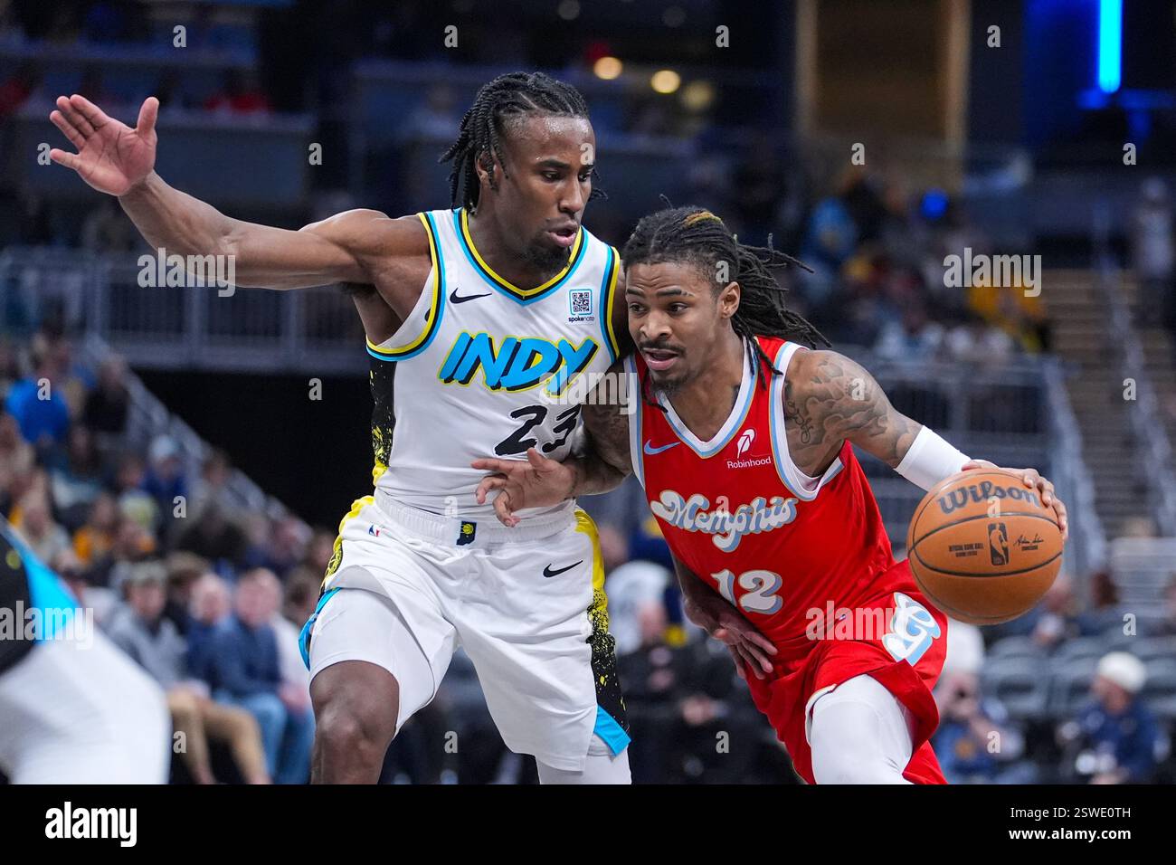 Memphis Grizzlies guard Ja Morant (12) drives on Indiana Pacers forward ...