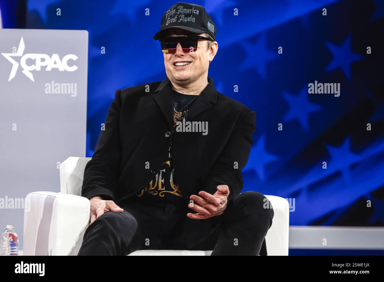 Washington Dc, USA. 20th Jan, 2025. Elon Musk takes the stage on the ...