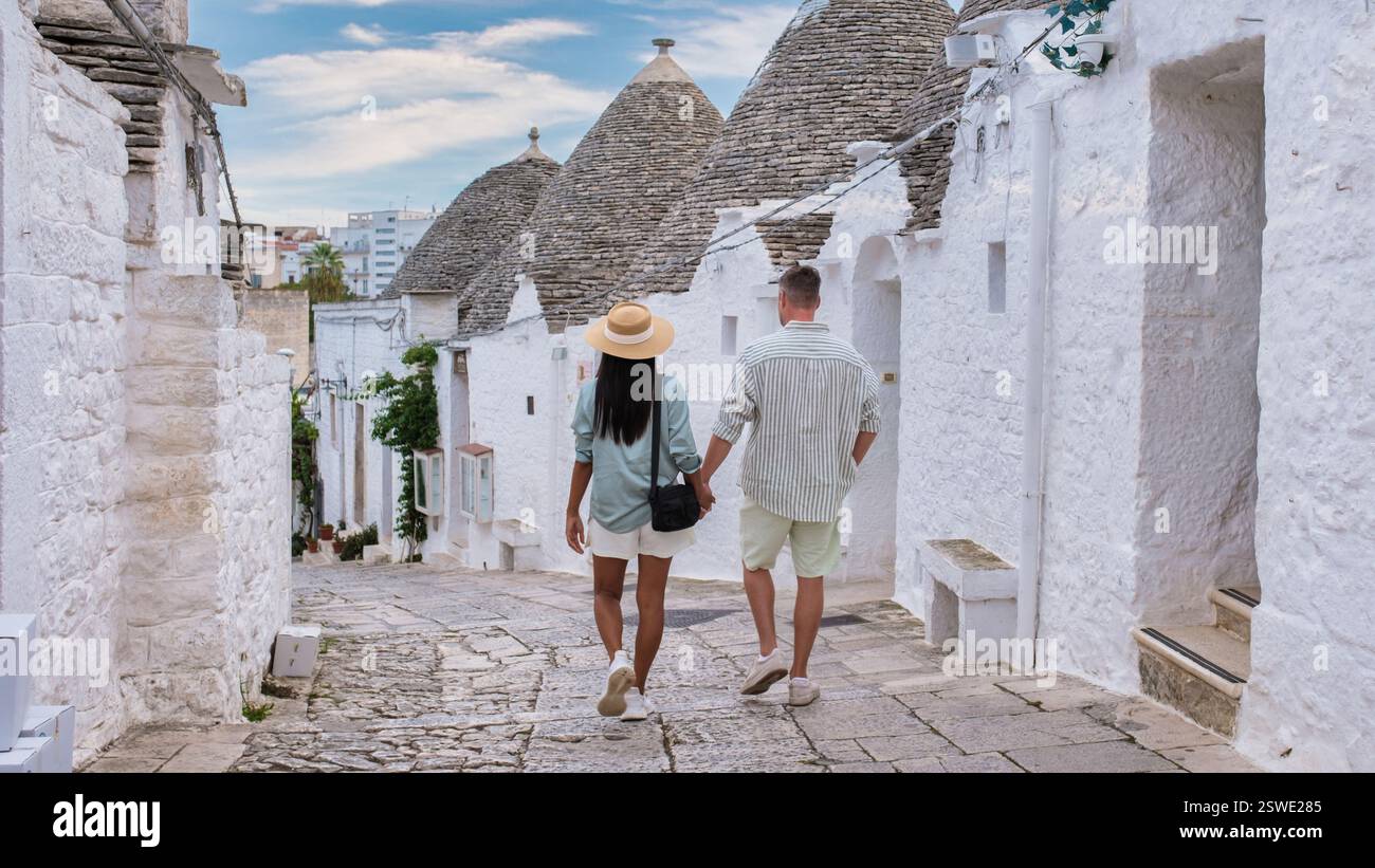 Strolling through the charming streets of Puglia, Italy, embracing ...