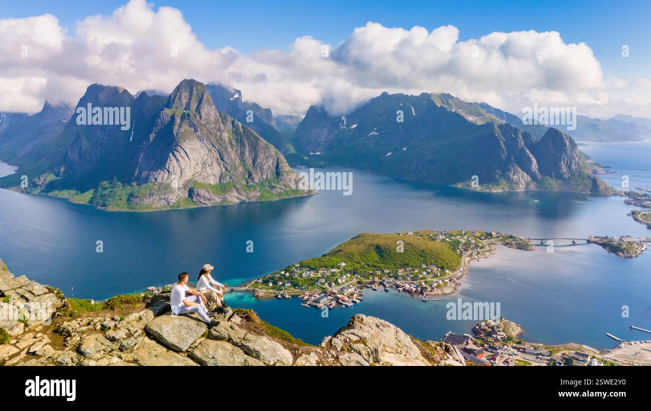 A scenic view from a mountaintop in Norway, showcases a stunning fjord ...