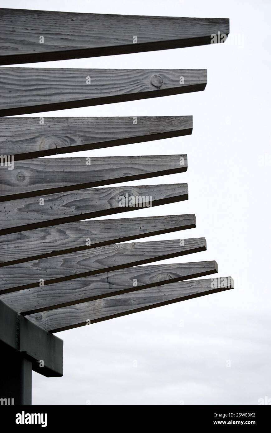 Wood beams against the grey sky Stock Photo - Alamy