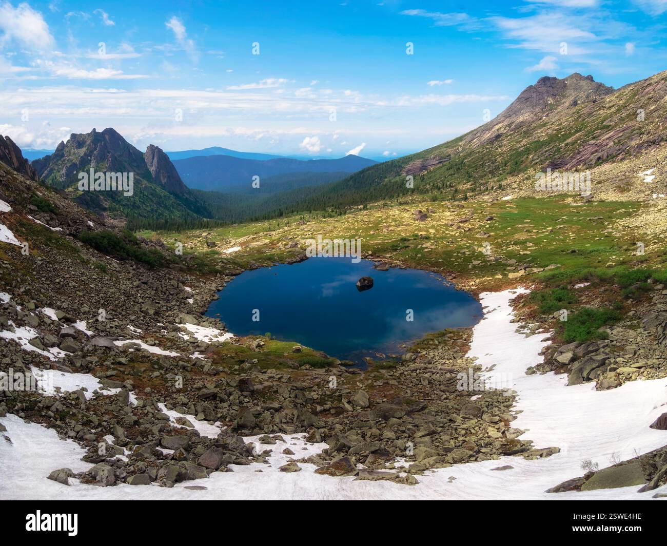Amazing top view of Fairy tale Lake with huge stones on the shores in ...
