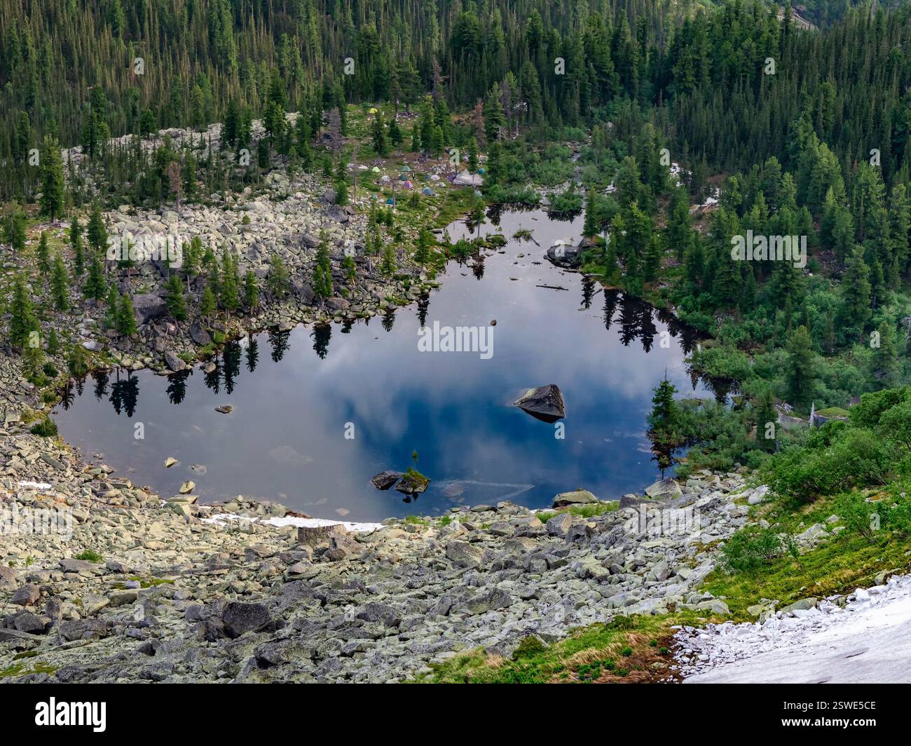 Aerial spectacular view to scenic valley with beautiful mountain lake ...