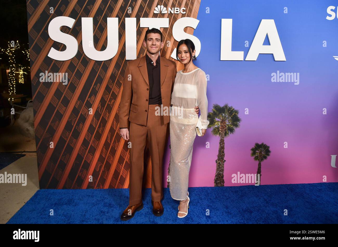 Bryan Greenberg, left, and Jamie Chung arrive at the premiere of "Suits ...
