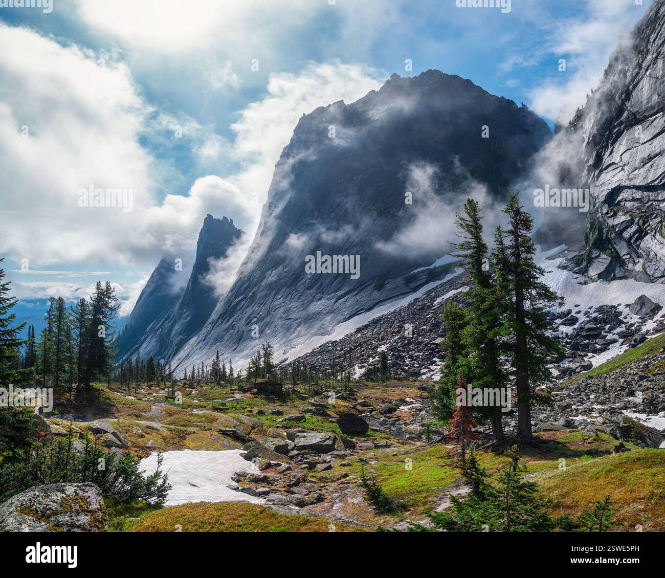 Scenic alpine morning landscape with great dragon shaped mountain under ...