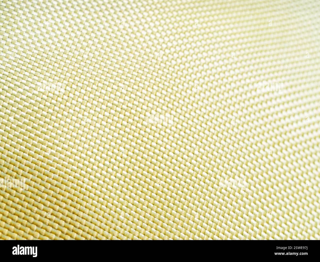 Bulletproof material aramid. Aramid kevlar background. Golden kevlar ...