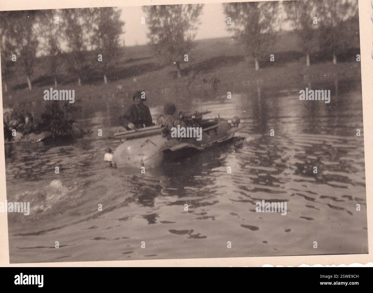 World War Two B&W photo German Soldiers in Camo Smocks cross a large ...