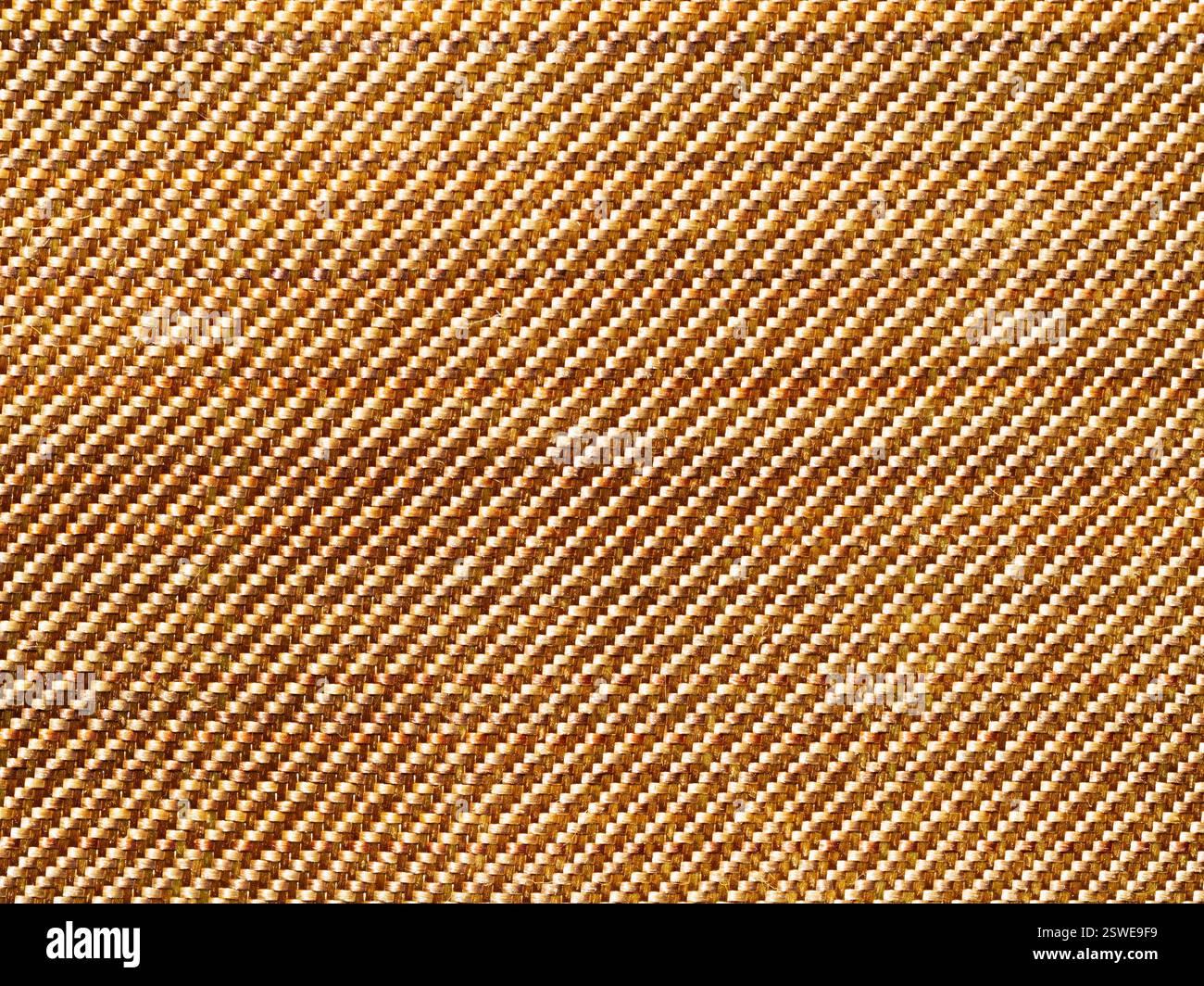 Bulletproof material aramid. Aramid kevlar background. Golden kevlar ...