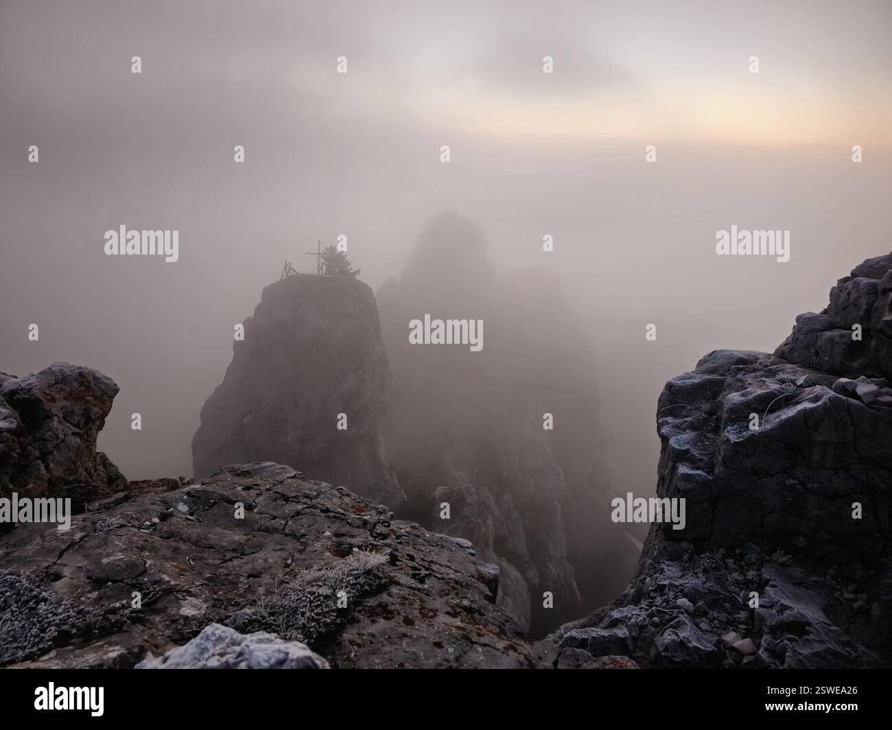 Rocks in dense fog natural background with high mountains hi-res stock ...