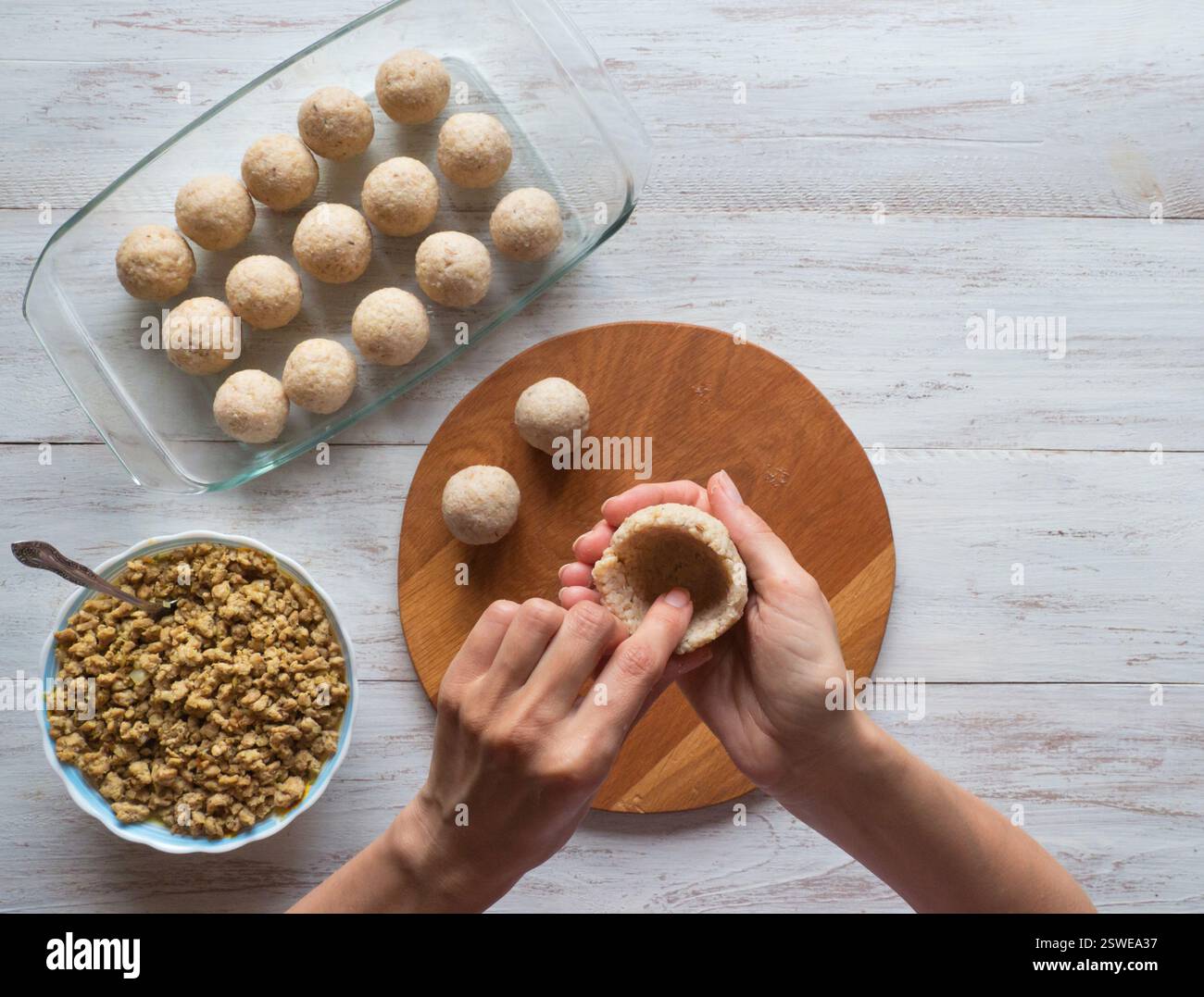 Cooking of Arabic meat appetizer Kibbeh. Traditional Arabic kibbeh with ...