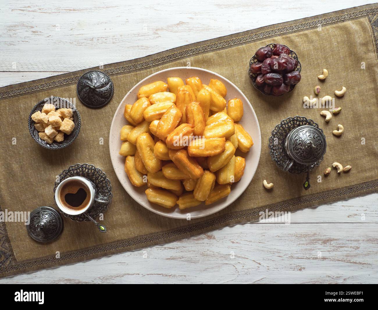Ramadan sweets background. Cookies of El Fitr Islamic Feast. Tulumba ...