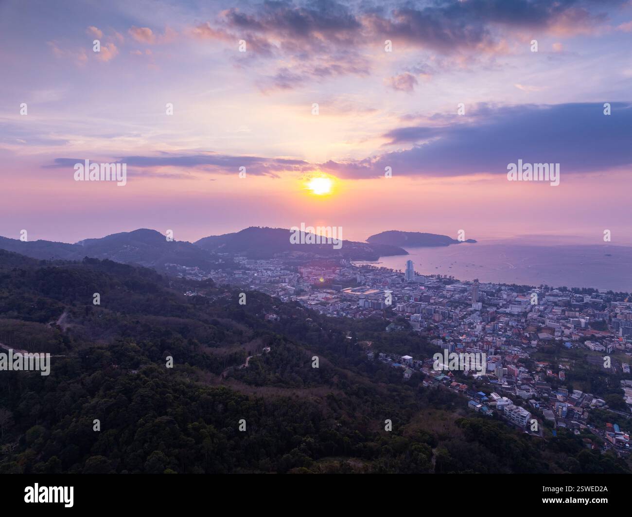 Aerial view of beautiful sunset sky over sea at Patong bay Phuket city ...