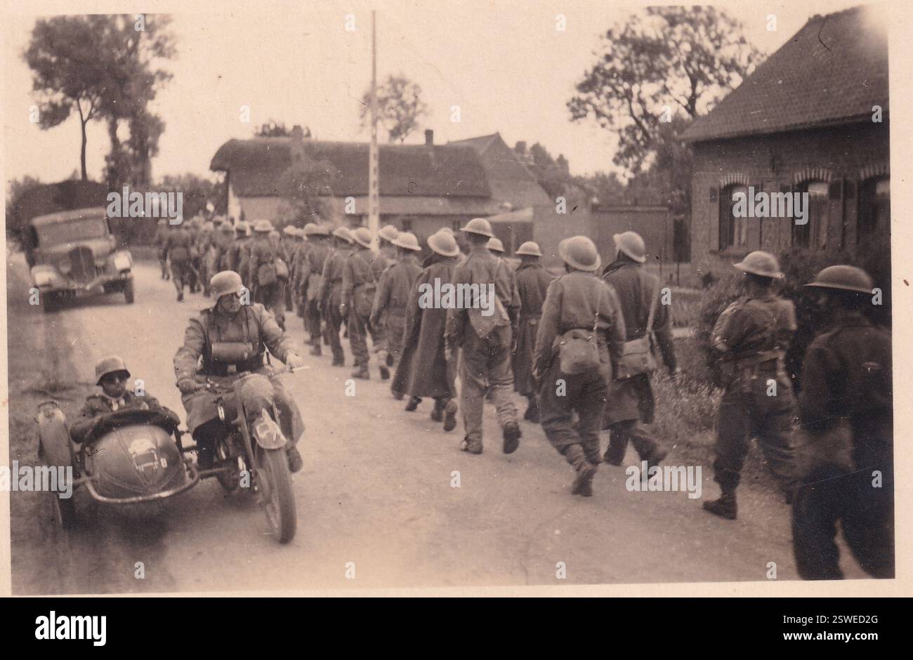 World War Two B&W photo German Troops of the SS Totenkopf Division pass ...