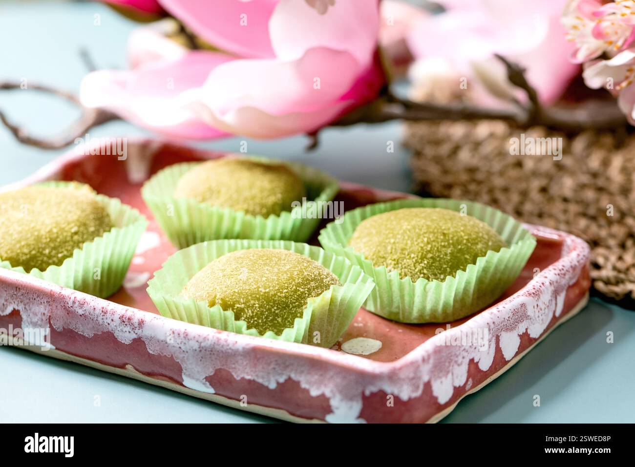 Close up of asian traditional rice dessert sweet green matcha mochi in ...