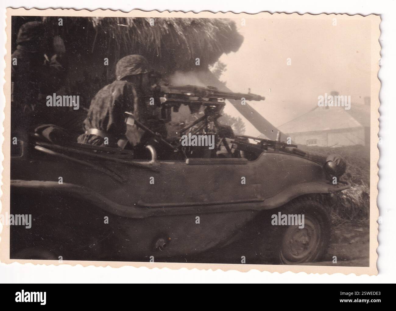 World War Two B&W photo German Waffen SS troops in Camo Smocks with an ...