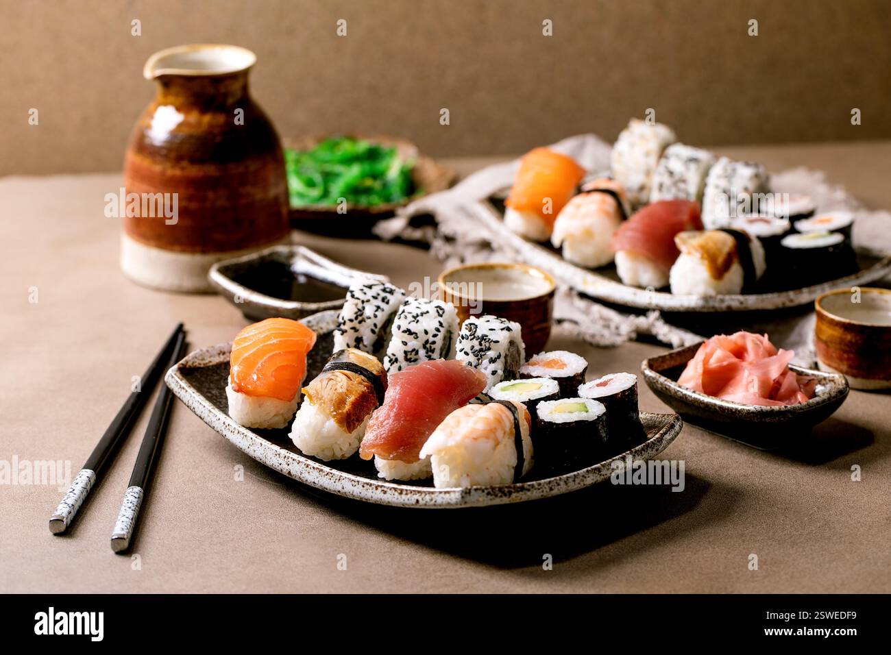 Japanese dish sushi and rolls rice with fish Stock Photo - Alamy