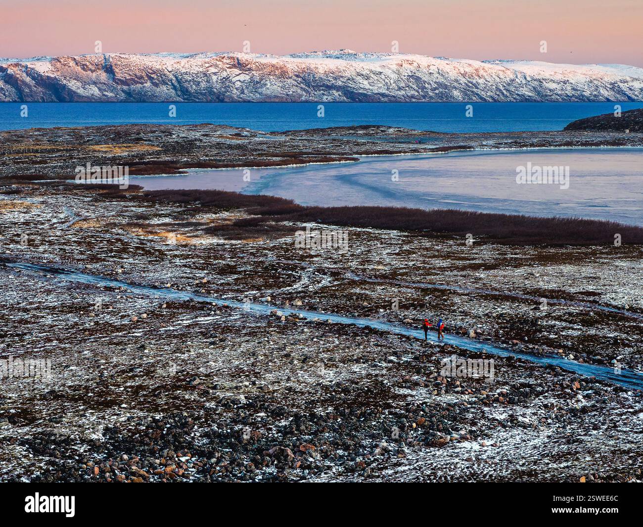 Icy slippery Arctic road through the tundra. Wonderful mountain ...