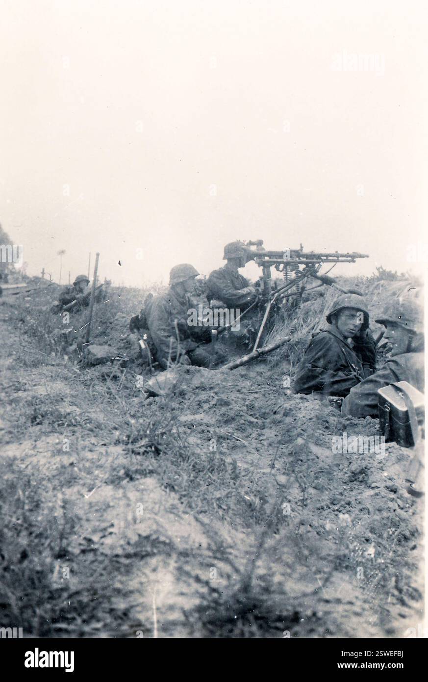 World War Two B&W photo Waffen SS Troops in Camo Smocks with a Heavy MG ...