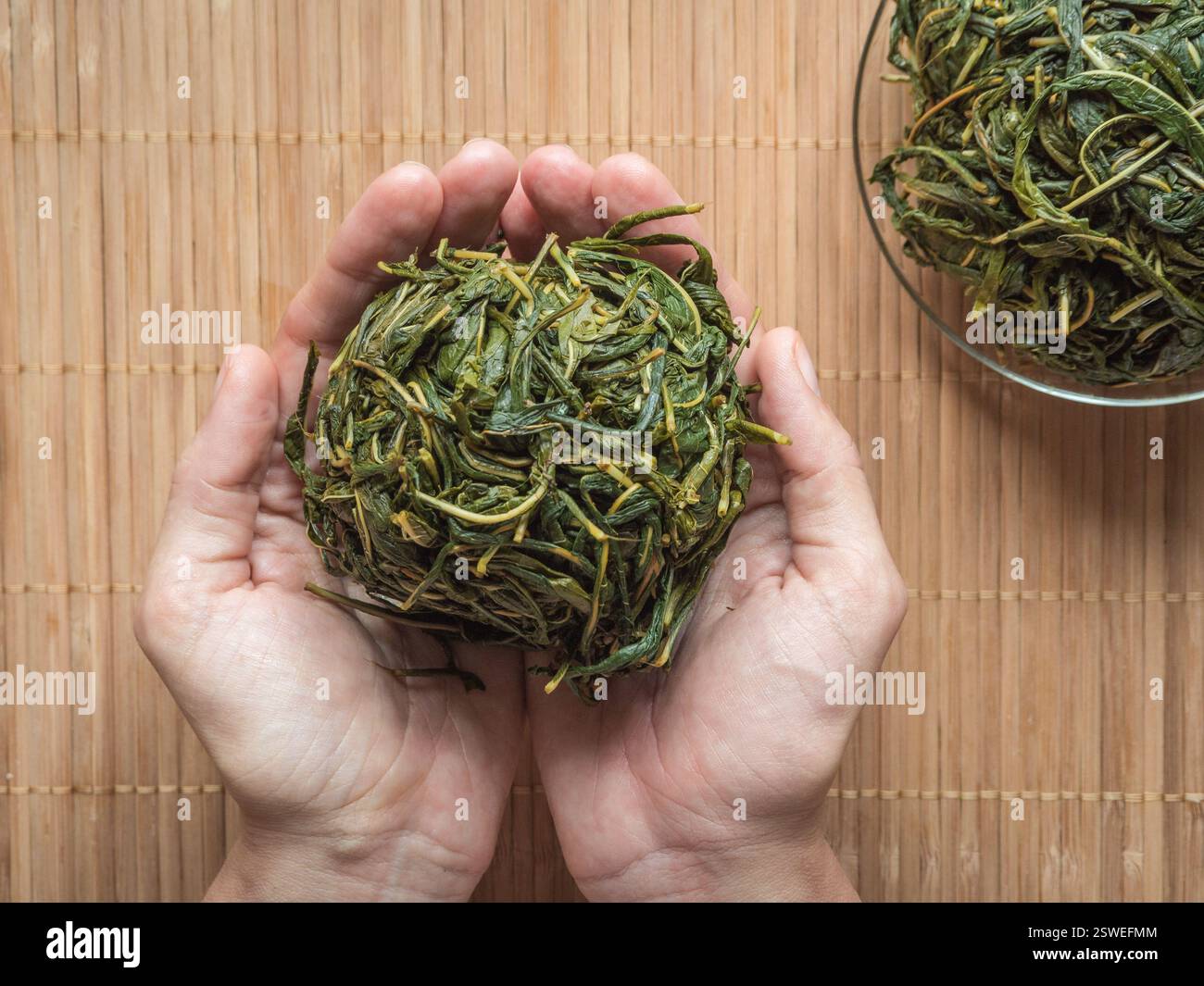 Fermentation process of tea leaves. Manual production Koporye Tea ...