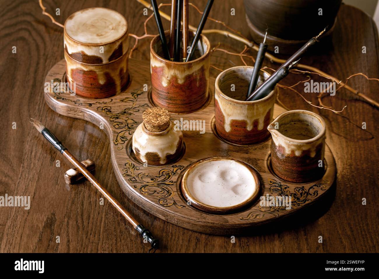 Handcrafted ceramic set for painting and calligraphy Stock Photo - Alamy