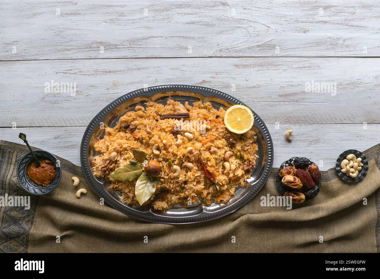 Vegetable Biryani, Vegetarian dish on a black table. Top view Stock ...