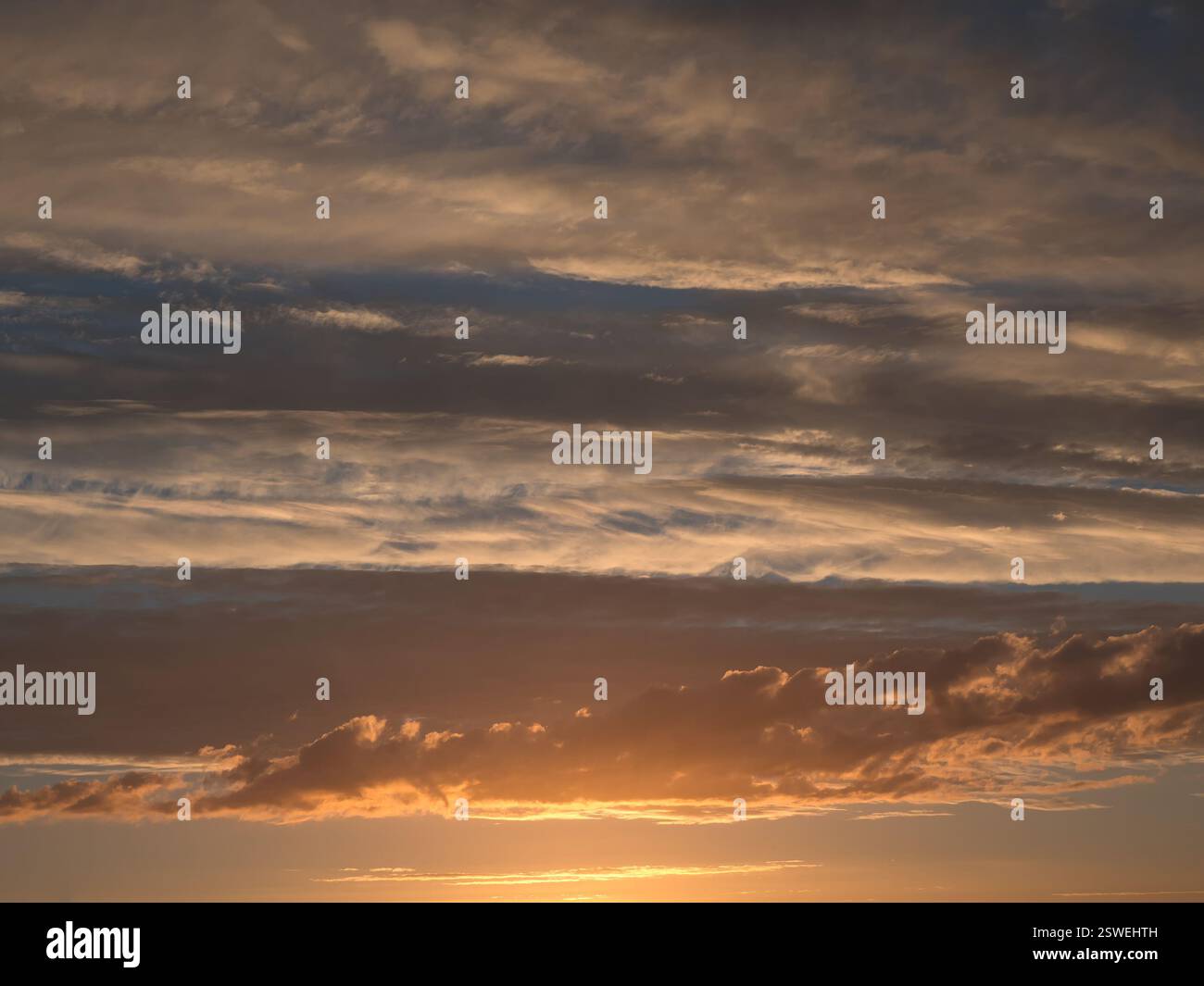 Dramatic sunset with twilight color sky and clouds Stock Photo - Alamy