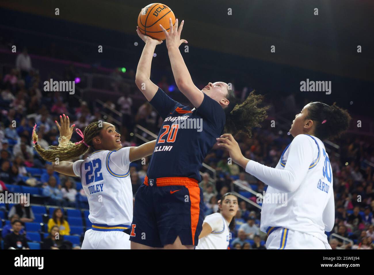 Illinois forward Berry Wallace (20) drives against UCLA forward Kendall ...