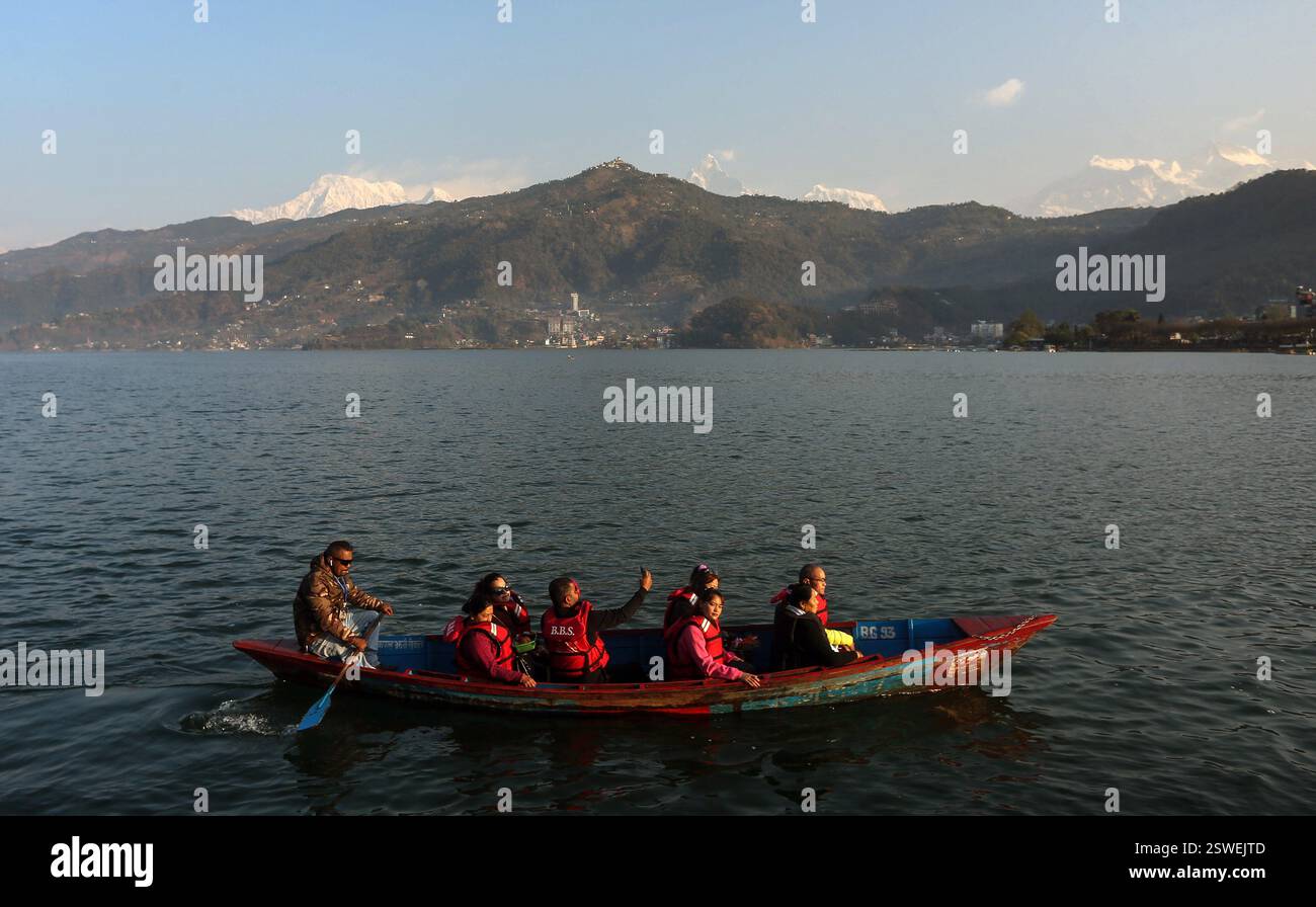February 21, 2025: People enjoy boating at Phewa lake in Pokhara, one ...