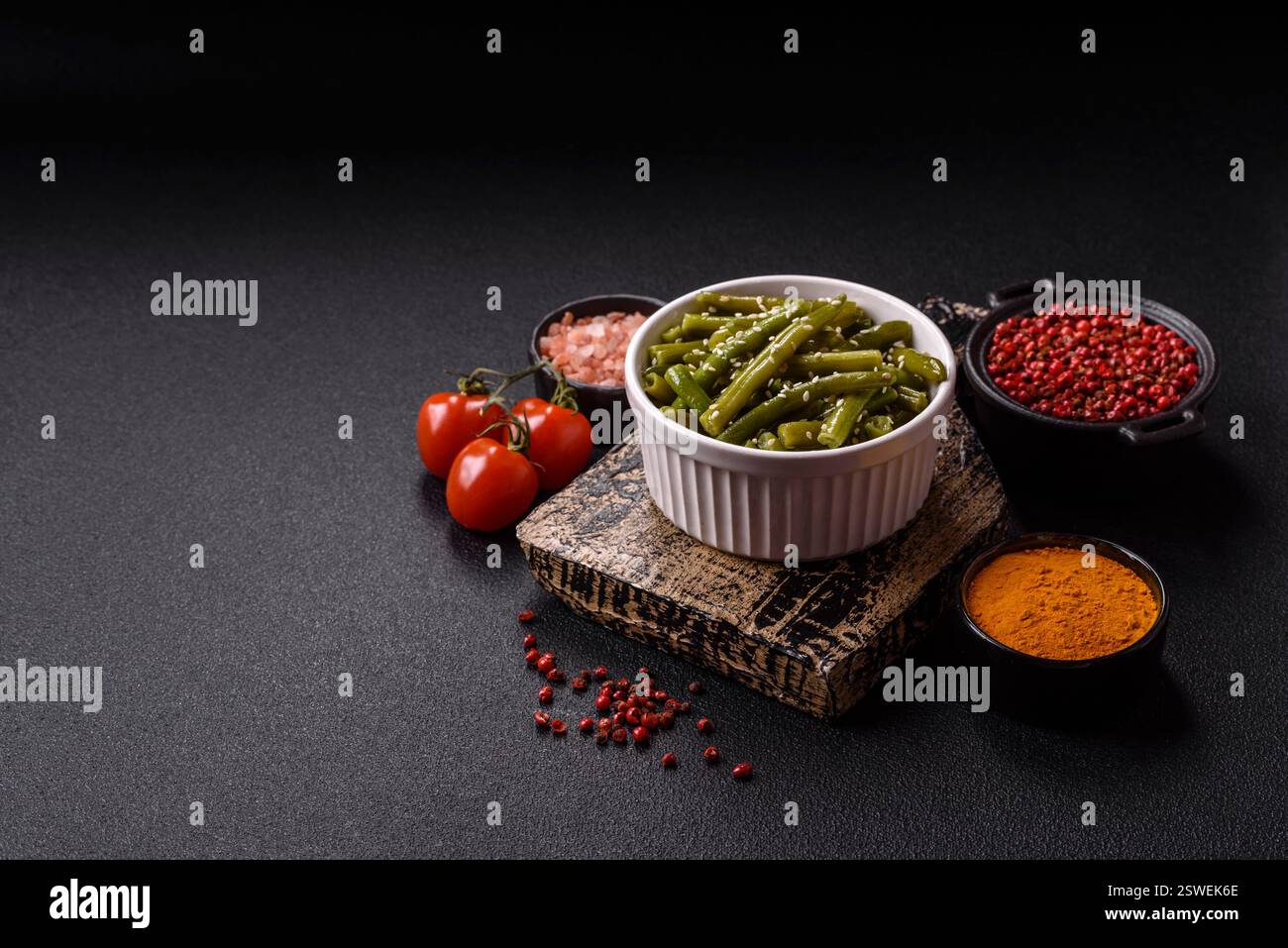 Steamed green beans on a plate with olive oil, sesame seeds Stock Photo ...