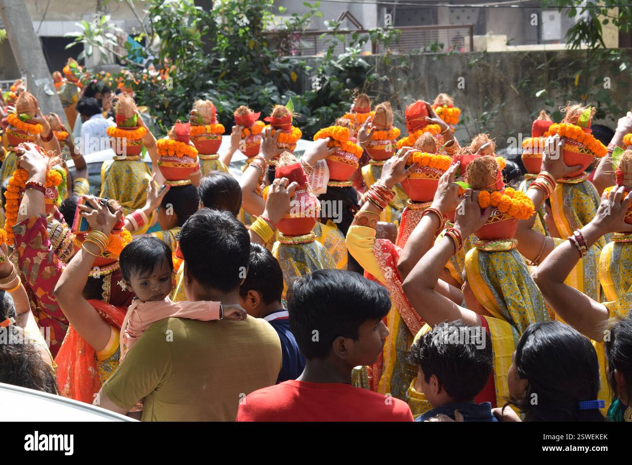 New Delhi, India July 25 2024 - Women with Kalash on head during ...