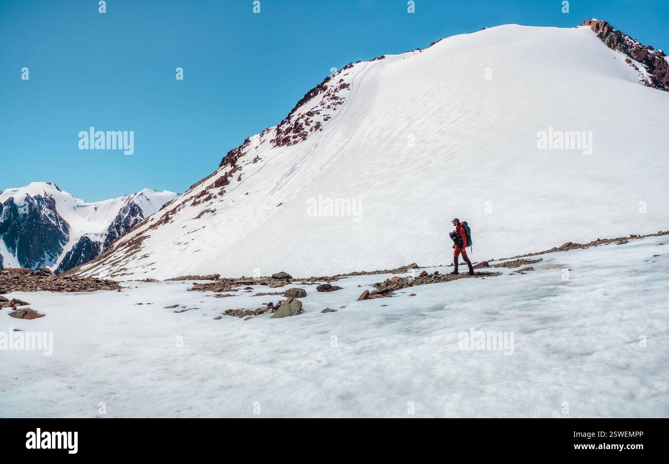 Winter hiking in the snow-capped mountains. Extreme recreation and ...