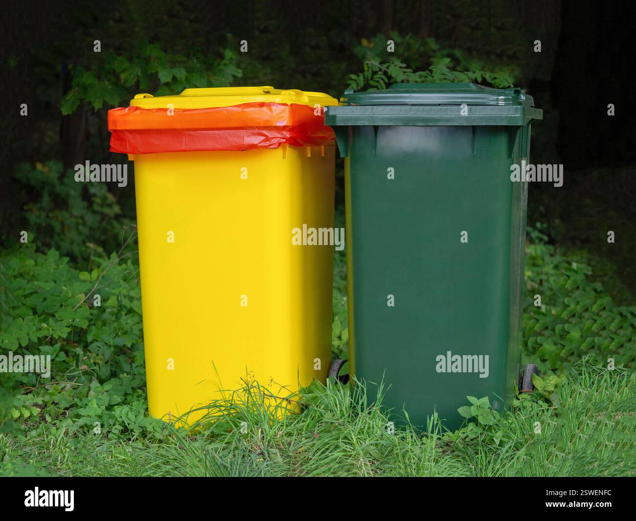 Multi-colored containers for separate garbage collection in a green ...