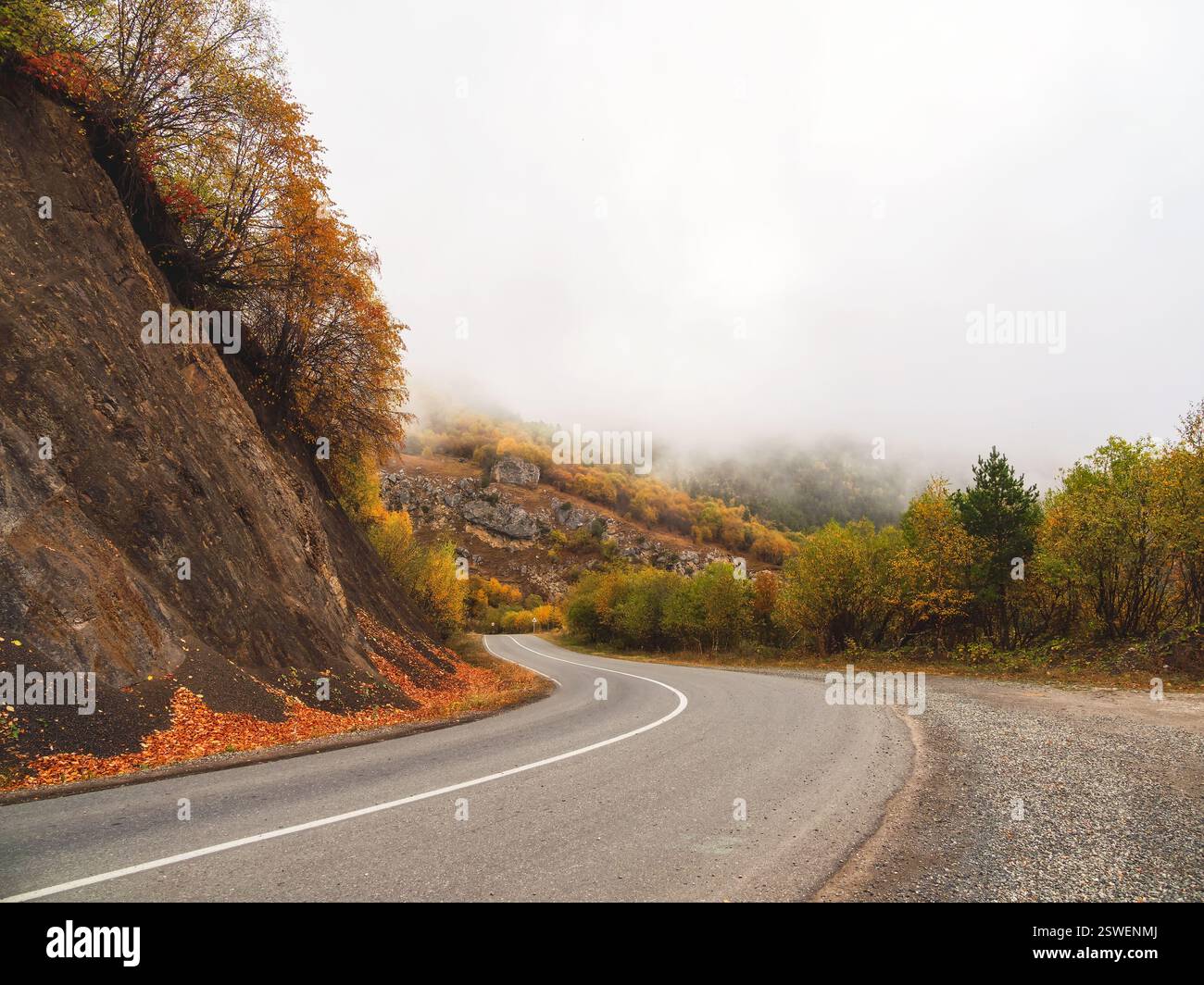 High Alpine road. Beautiful autumn high-mountain highway with dangerous ...