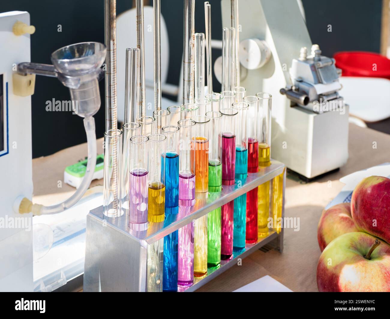 Test tubes with a colored reagents. Close up Stock Photo - Alamy