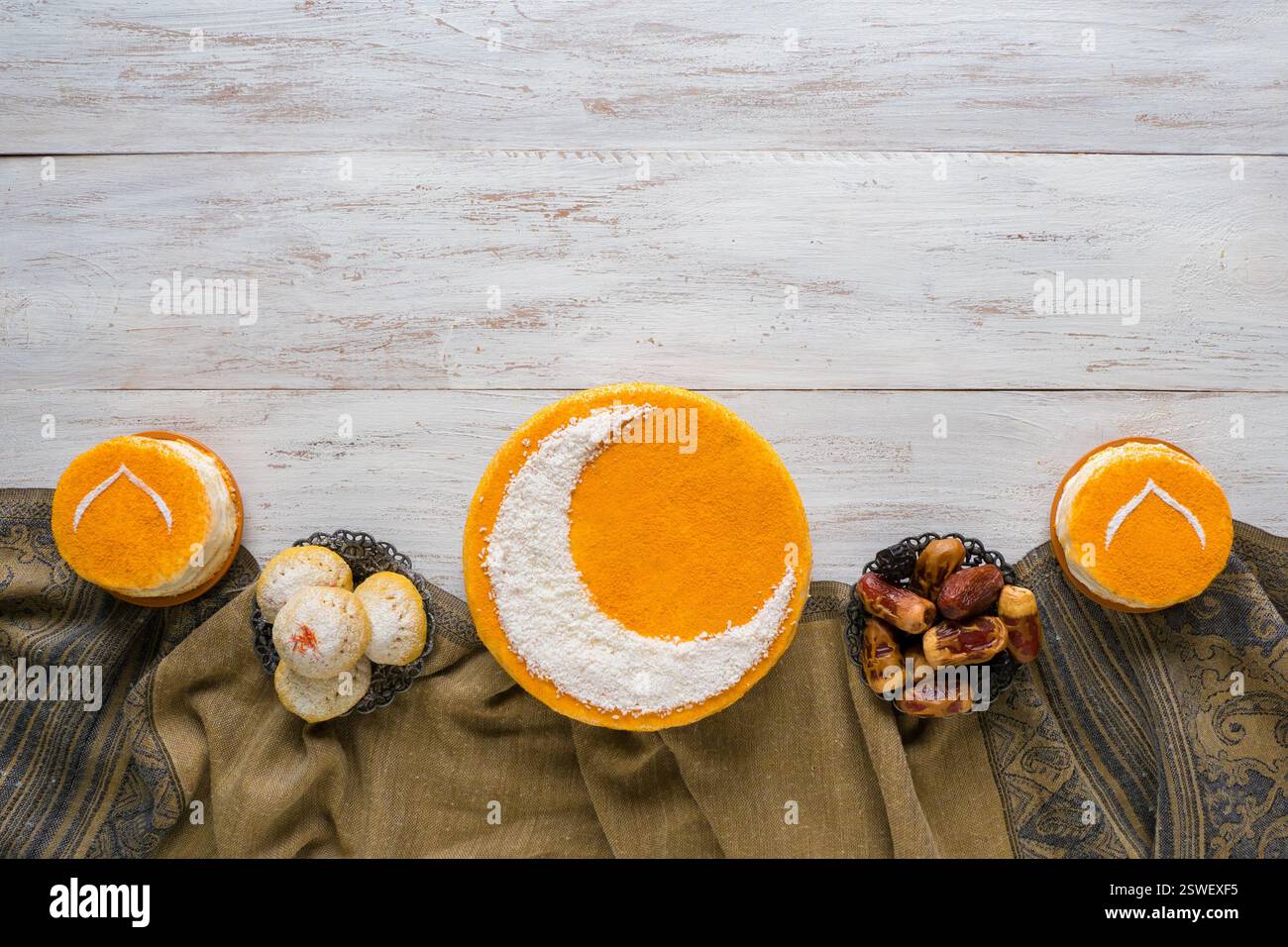 Festive food Ramadan background. Delicious homemade golden cake with a ...
