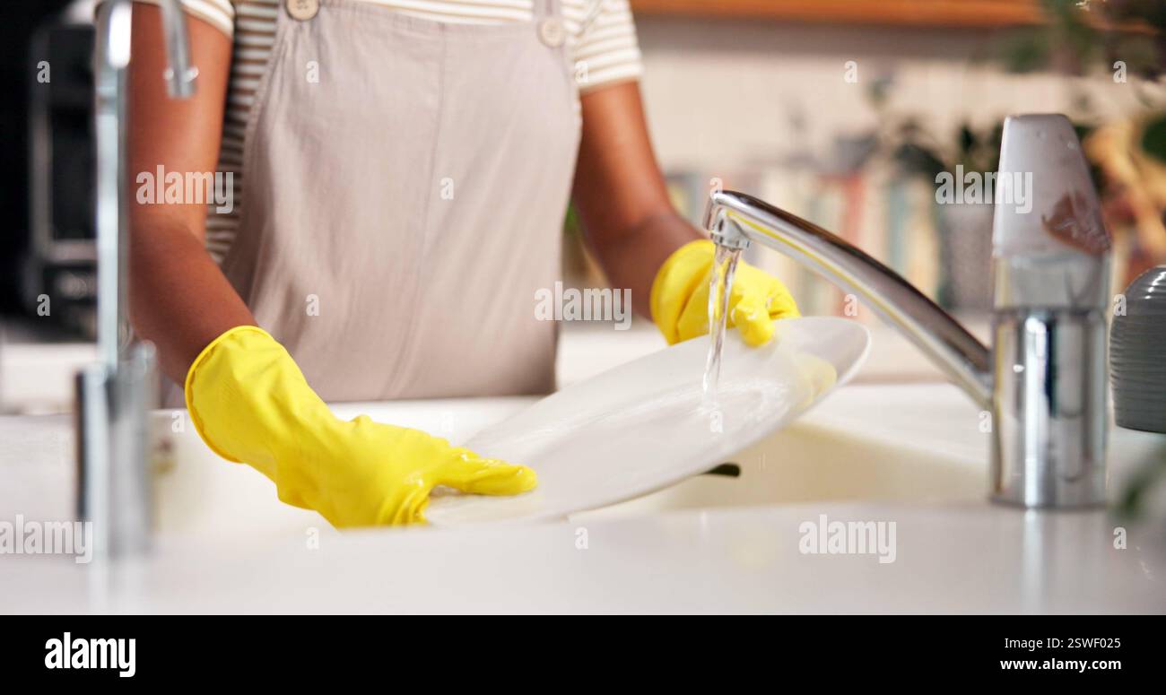 Hands, washing dishes and water with plate in kitchen for hygiene ...