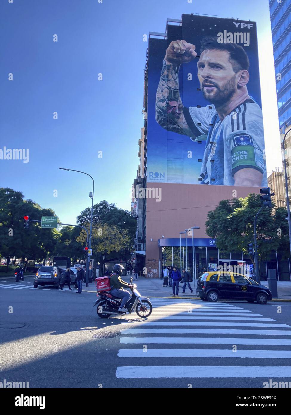 Giant photograph of Lionel Messi in winning pose, advertising for YPF ...