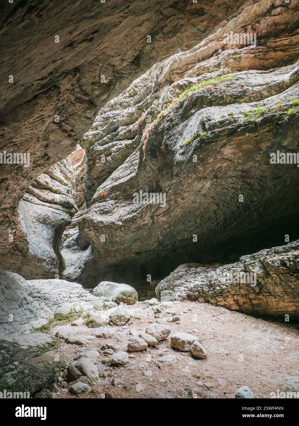 Interesting rocks forming a narrow passage in the Saltinskij gorge. A ...