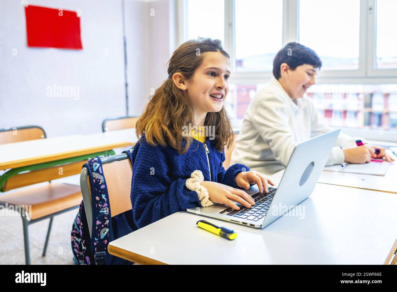 Students writing using supplies hi-res stock photography and images - Alamy