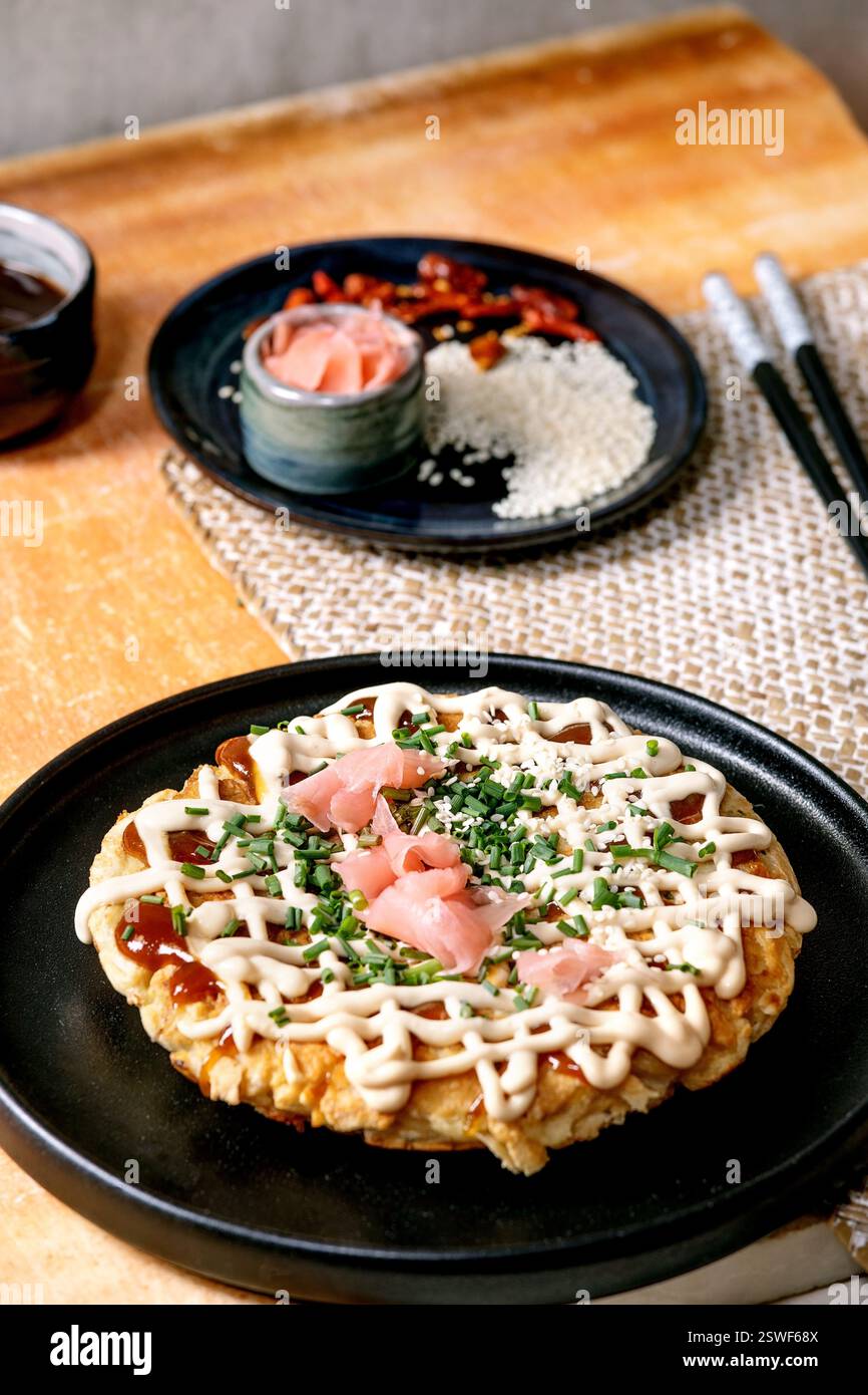 Japanese fast food okonomiyaki hi-res stock photography and images - Alamy