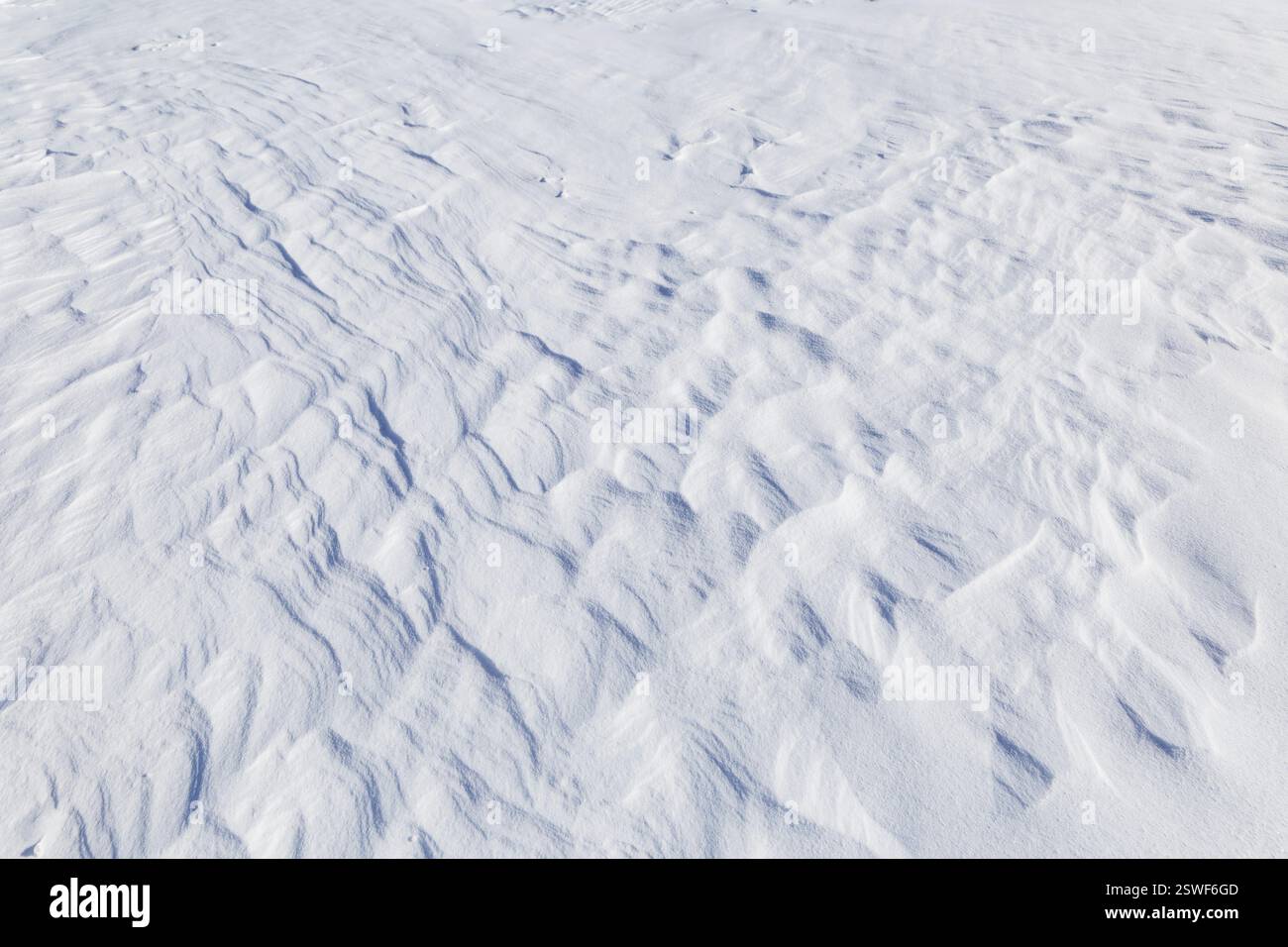 Winter, snowdrift pattern on a frozen river, Province of Quebec, Canada ...