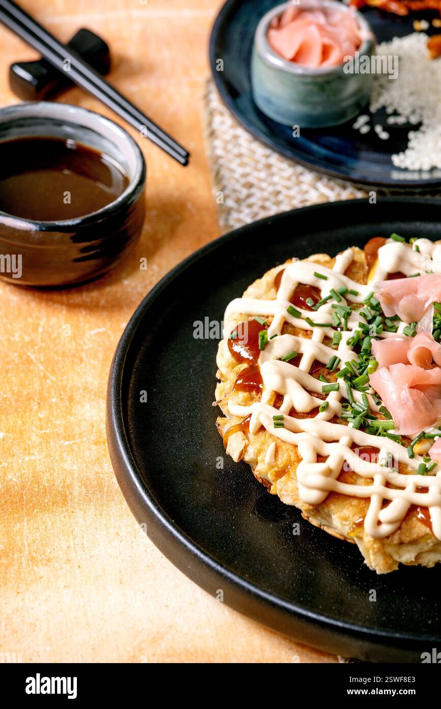 Japanese fast food okonomiyaki Stock Photo - Alamy